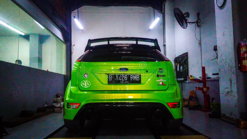 Green Second Generation of Ford Focus RS on Working Bay Editorial Stock ...