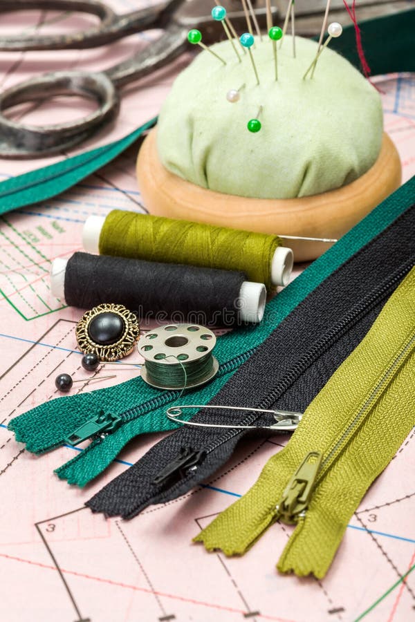 Green sewing accessories stock photo. Image of zipper - 52584600