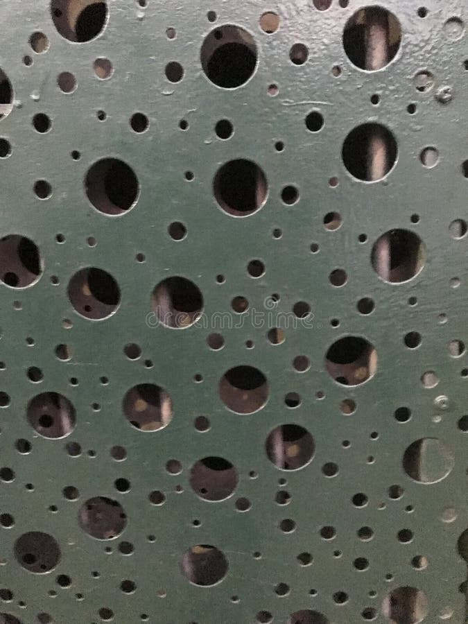 Green Sheet Metal Covering with Holes Stock Image - Image of texture ...