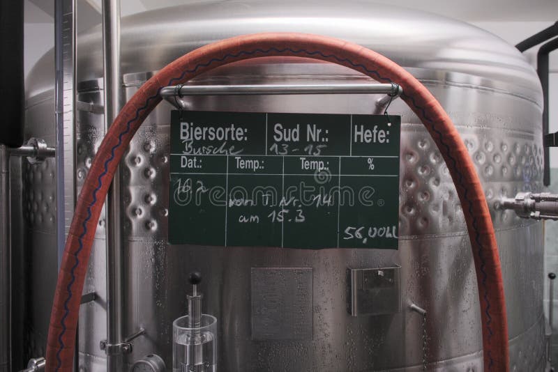 Green Sign on a Beer Storage Tank Displays Notes on the Type of Beer in ...