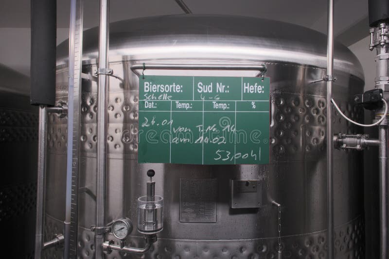 Green Sign on a Beer Storage Tank Displays Notes on the Type of Beer in ...