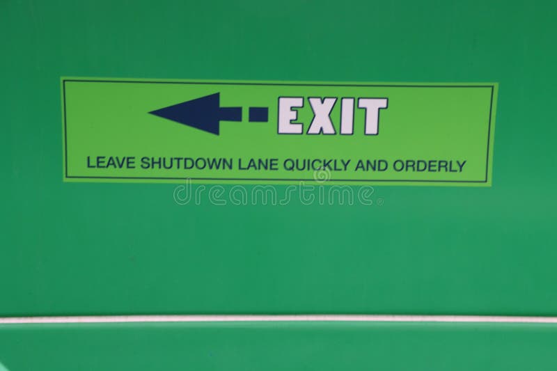 Green Sign To Exit Quickly and Orderly in Shades of Green and White ...