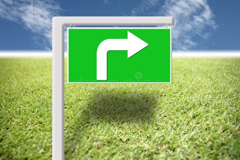 Green Signs with Arrows on the Grass and Blue Sky. Stock Photo - Image ...