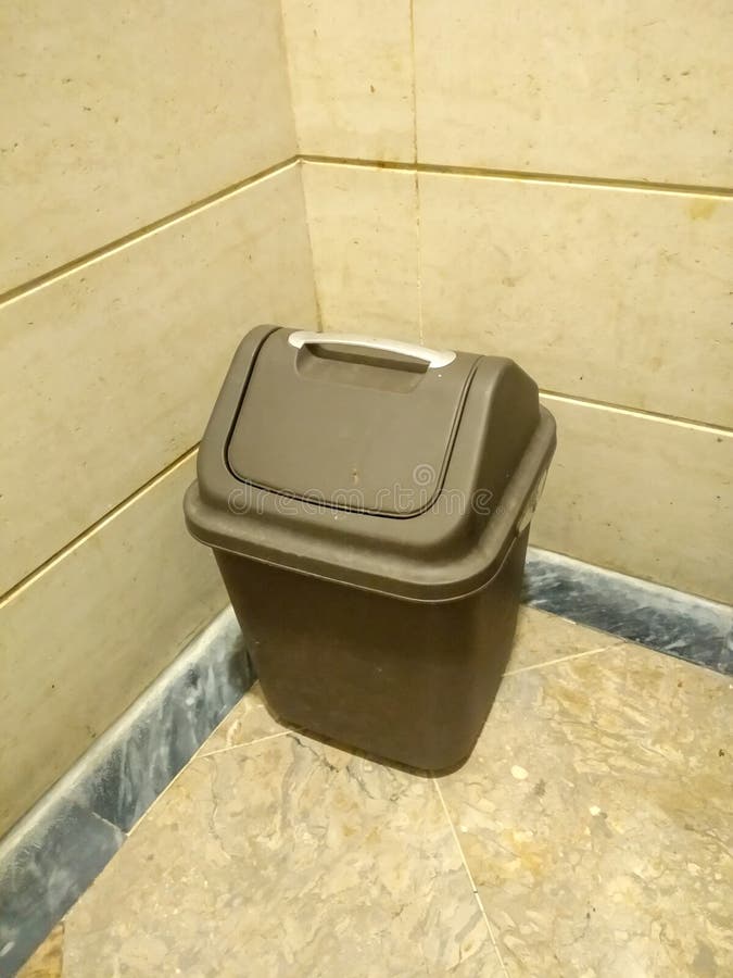 Green Single Plastic Trash Box or Rubbish Container in a Bathroom Stock ...