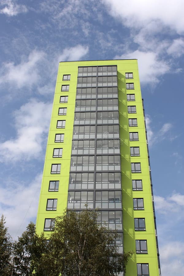 Green Skyscraper Against of Clouds Stock Photo - Image of tower, green ...