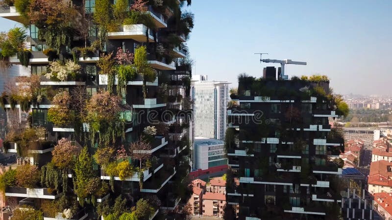 Green Skyscraper Building with Plants Growing on the Facade Stock Photo ...