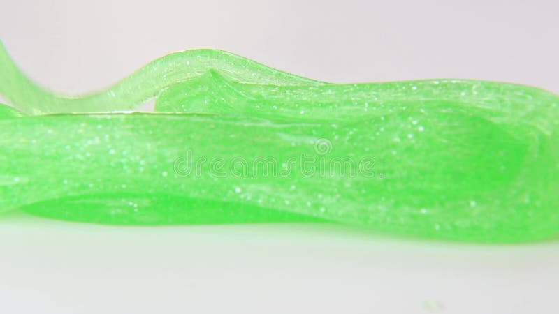 The Green Slime Slowly Stretches and Lies Down in a Pile. Stock Video ...