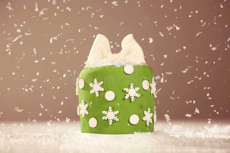 Green small cake with snow stock photo. Image of green - 58061964