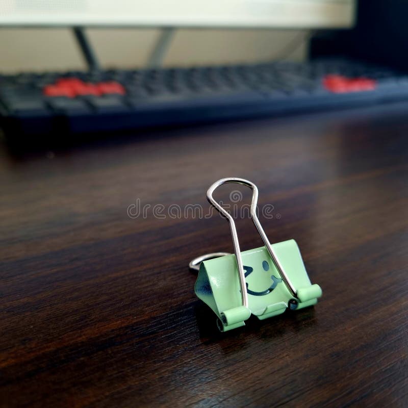 Green Smiley Paper Clip on the Office Desk Stock Image - Image of paper ...