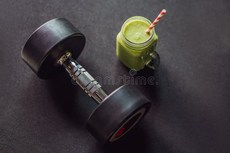 Green Smoothies and Dumbbells in the Gym Stock Image - Image of green ...