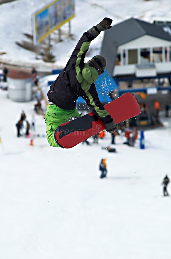 Green snowboarder fly stock photo. Image of lifestyle - 6085500
