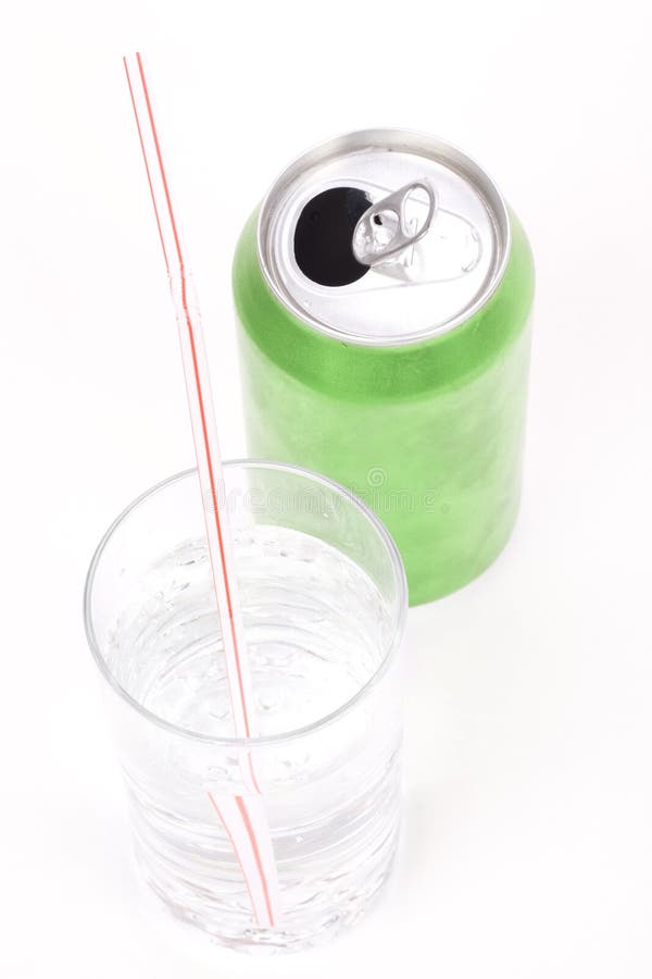 Green soda can and glass stock photo. Image of flowing - 3493316