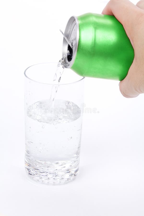 Green soda can and glass stock photo. Image of flowing - 3493316