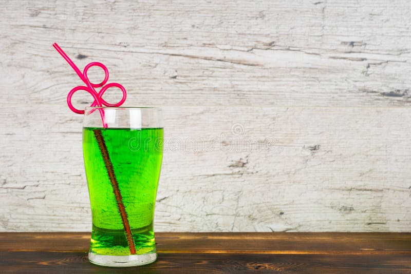 Green Soft Drink with Cocktail Pipe on Table Stock Photo - Image of ...