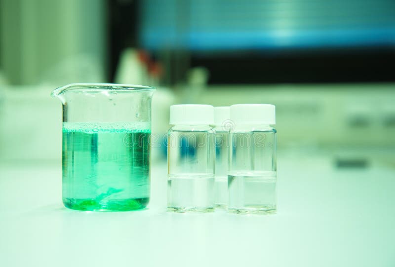 Green Solution in Beaker in Science Lab Stock Photo - Image of ...