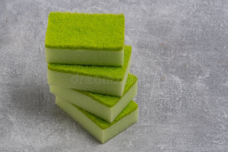 Green Sponges for Washing Dishes on a Gray Stone Background Stock Image ...