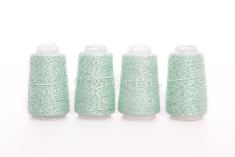 Green Spool of Thread Isolated on White Background. Skein of Woolen ...