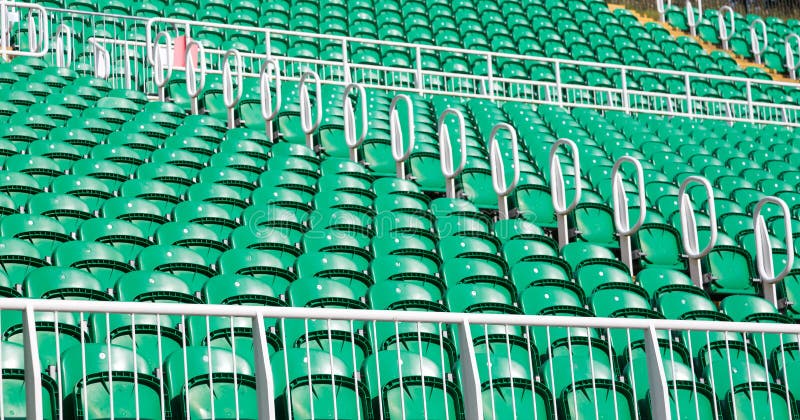 Green stadium seats stock photo. Image of outdoor, green - 76627800