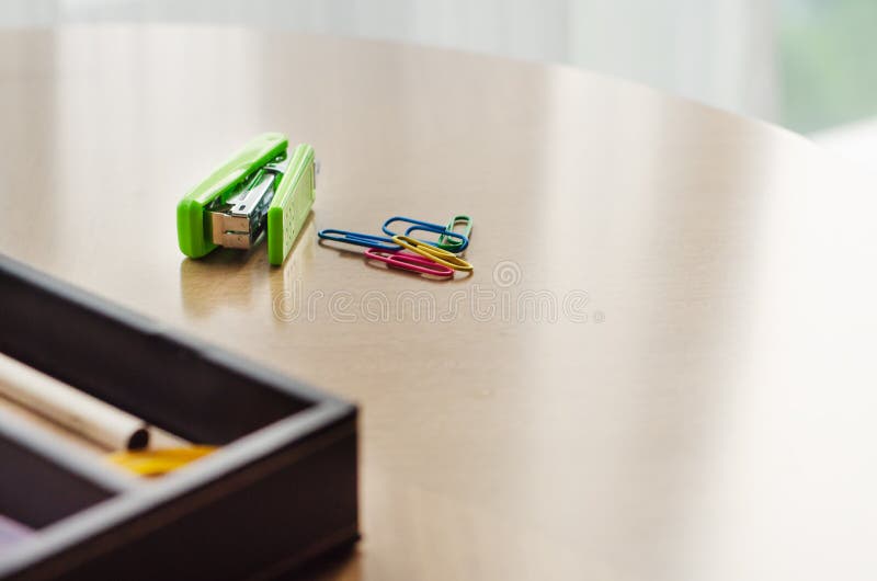 Green Stapler and Paper Clip Stock Image - Image of metal, iron: 49627645