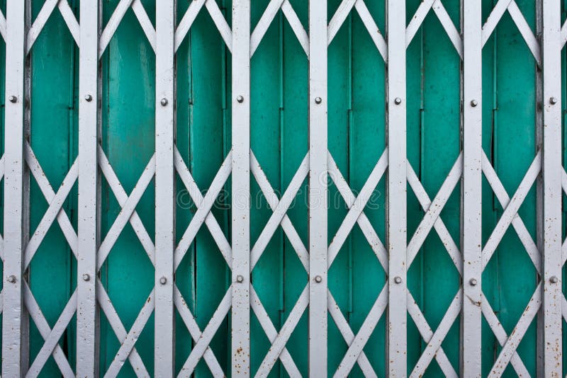 Green steel shutter gate stock photo. Image of gate, city - 29424510
