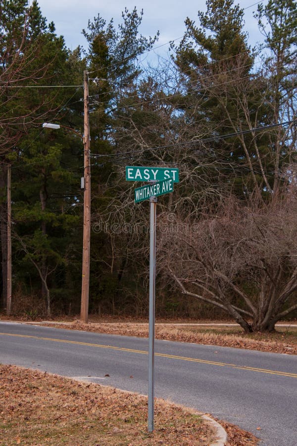 Green Street Sign with White Letters that Says, Stock Image - Image of ...