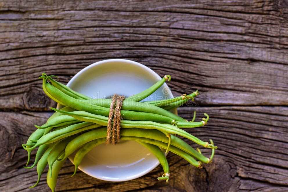 Green String Beans in a Bowl on Rustic Wooden Table Stock Photo - Image ...