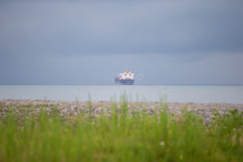 A Green Strip of Grass, the Sea Stock Image - Image of transport, blue ...