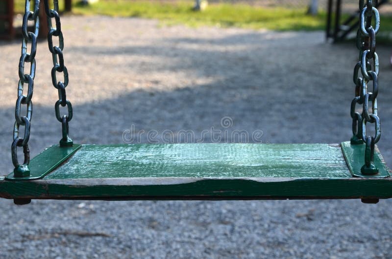 Two Green Swing for Kids Playing Stock Image - Image of empty, color ...