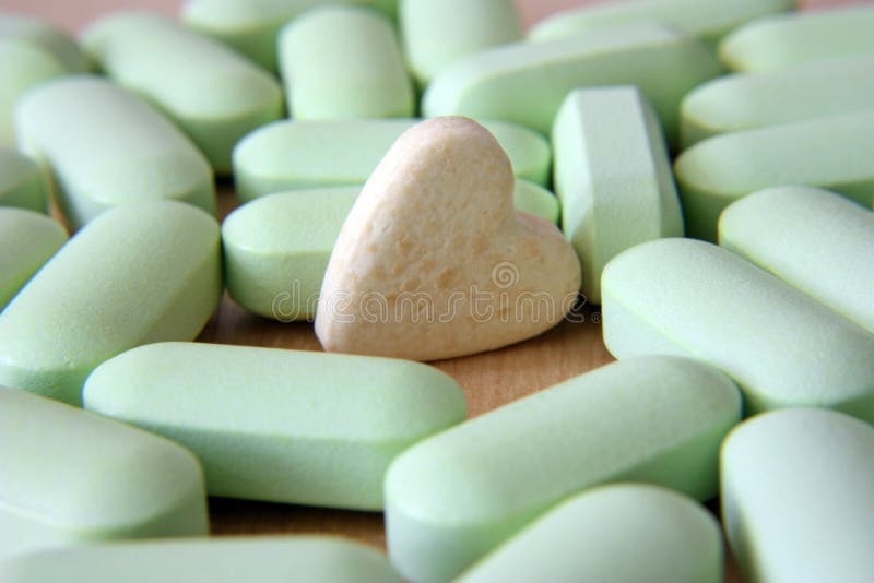 Green tablets stock image. Image of heart, doze, health - 19540405