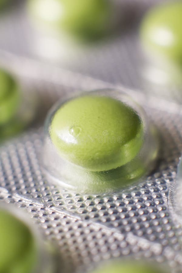 Green tablets stock photo. Image of green, illness, industry - 50971290