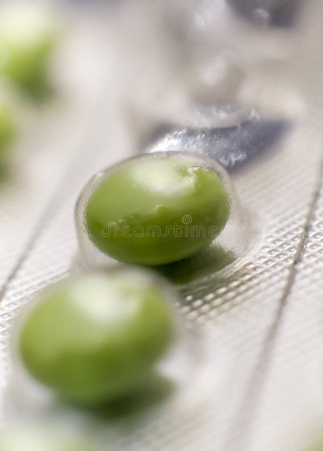 Green tablets stock image. Image of capsule, container - 50971401