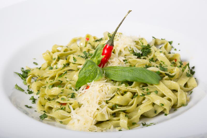 Green tagliatelle pasta stock image. Image of pepper - 73593441