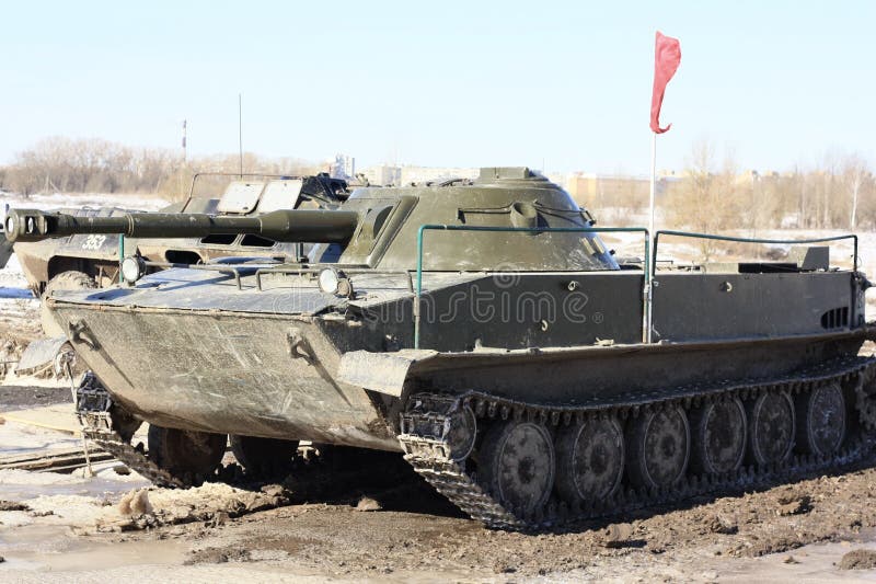 Green tank in the snow stock image. Image of caterpillar - 244286569