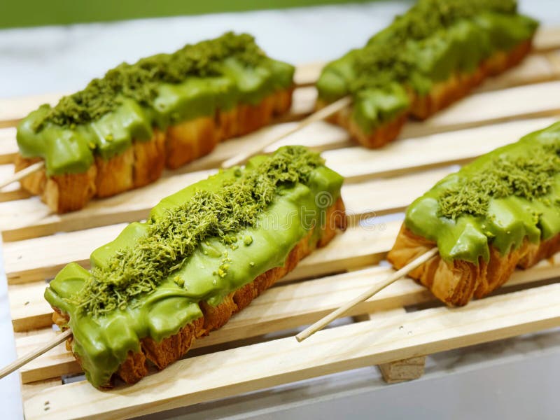 Green Tea Cake on Bamboo Skewers, Close-up, Selective Focus Stock Photo ...