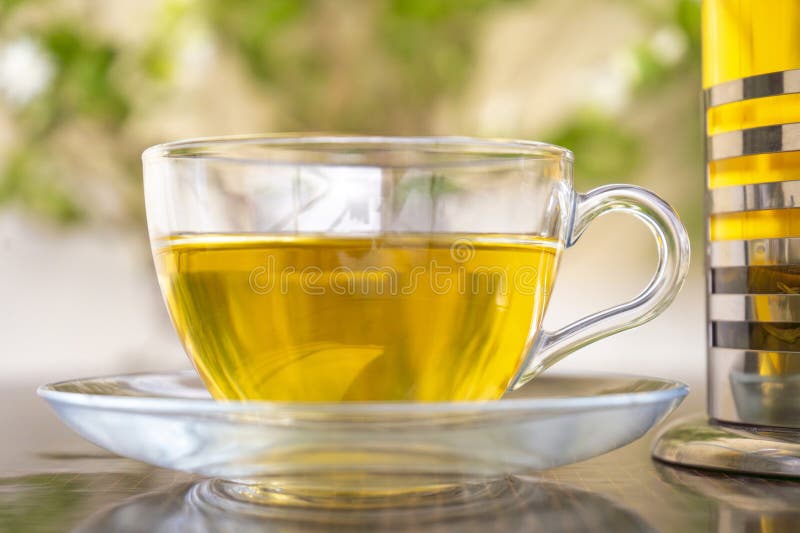 Green Tea in a Tea Cup Leaf Green Tea Leaves Organic Tea Stock Image ...