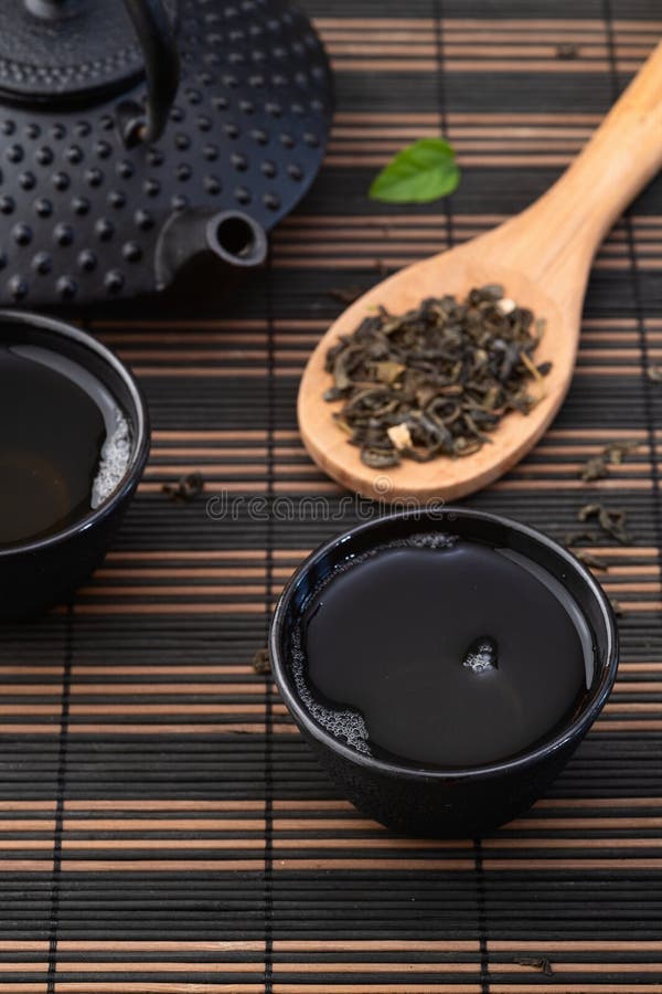 Green Tea with Japanese Teapot and Leaves Stock Photo - Image of herbal ...