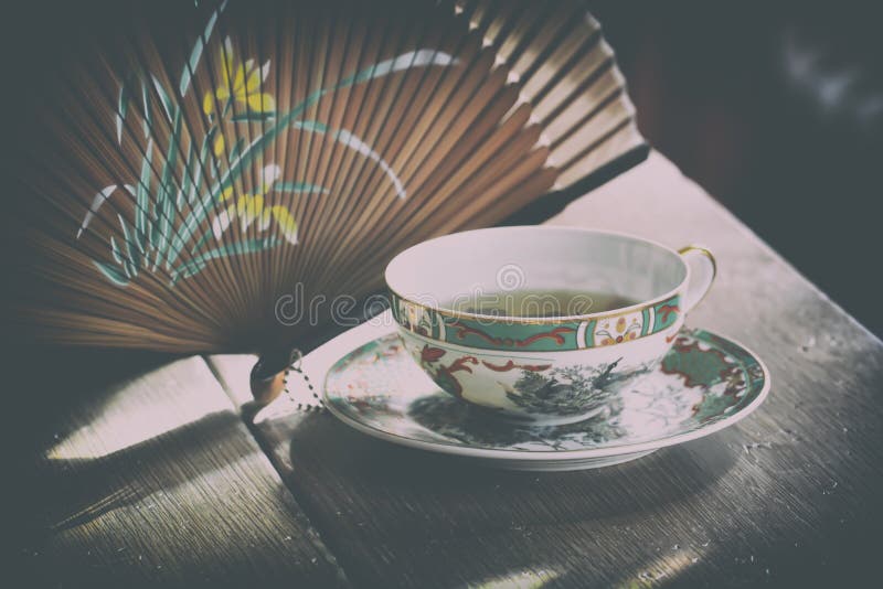 Green tea in old porcelain stock photo. Image of retro - 177187080