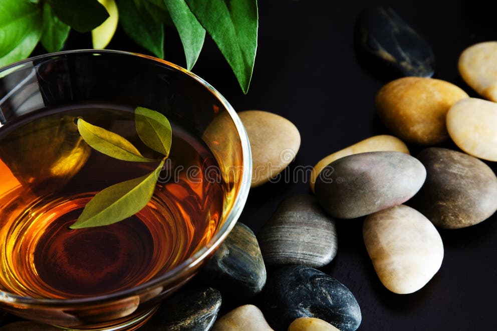 Green tea and pebbles stock image. Image of herbal, culture - 4311485