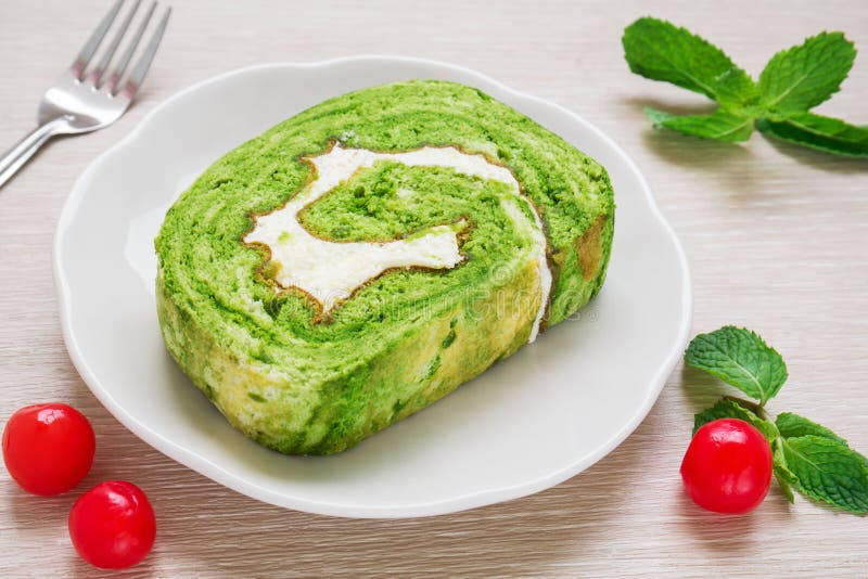 Green Tea Roll Cake on Plate Stock Photo - Image of cake, mint: 39759444