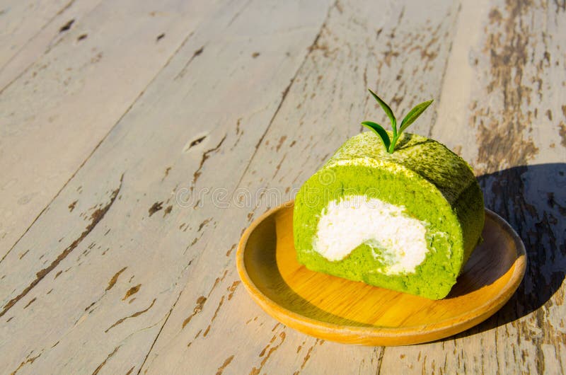Green Tea Roll on the Wood ATable Stock Photo - Image of chocolate ...