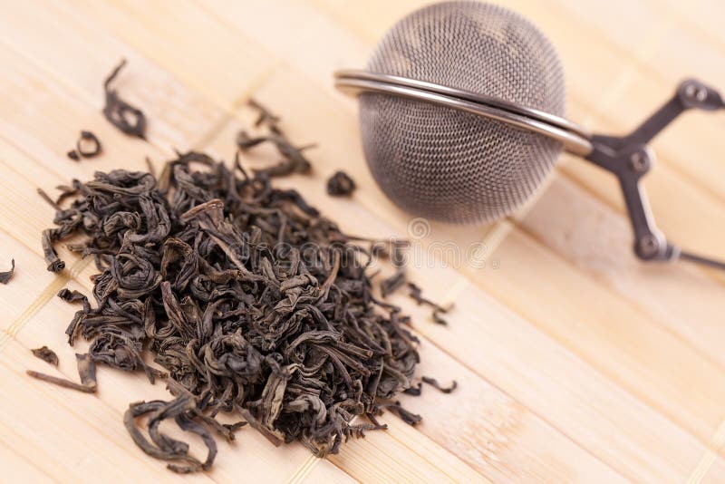 Green tea and tea strainer stock image. Image of isolated - 12732759