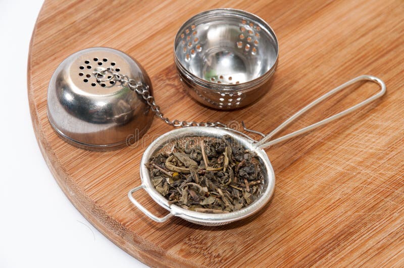 Green tea in tea strainer stock photo. Image of commercial - 53322618