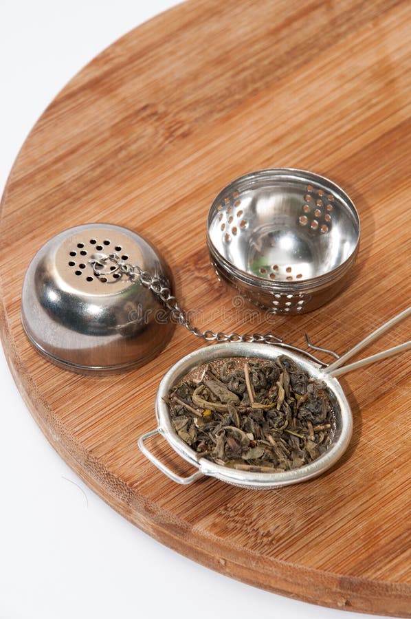 Green tea in tea strainer stock photo. Image of green - 53322660
