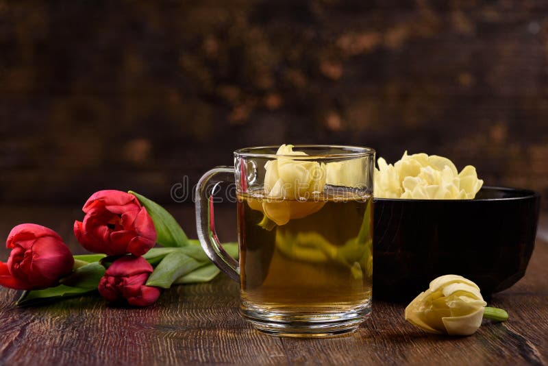 Green tea with a tulip bud stock photo. Image of bouquet - 111541330