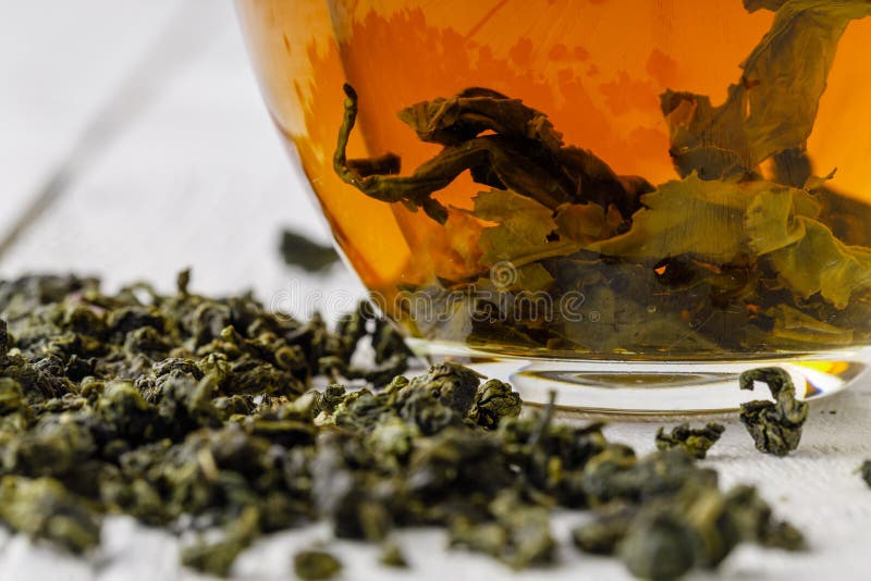 Green tea in a white cup stock image. Image of leaf - 184007733