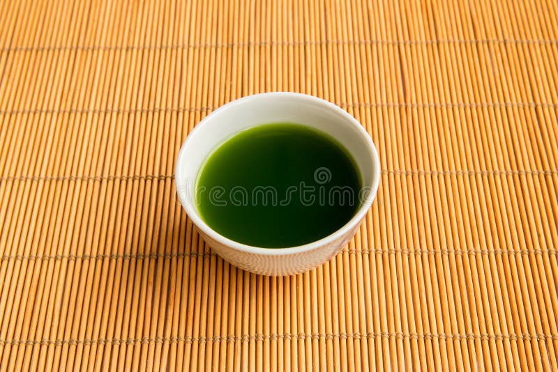 Green tea in a white cup stock image. Image of white - 53533761