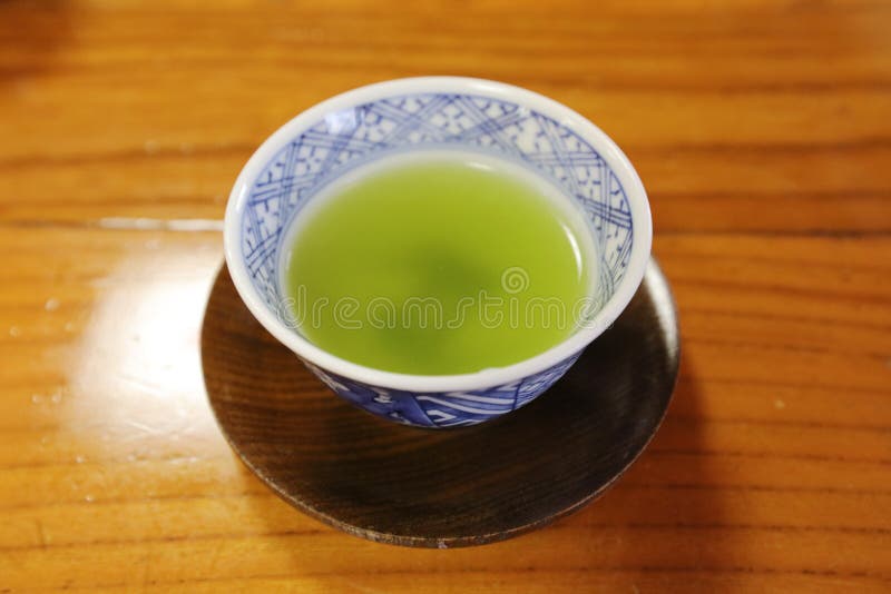 Green Tea in a White Cup on a Ood Background Stock Photo - Image of ...