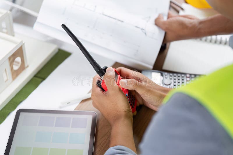 Green Tech Engineers Coordinating Wind Energy Project Details Stock Image - Image of ...