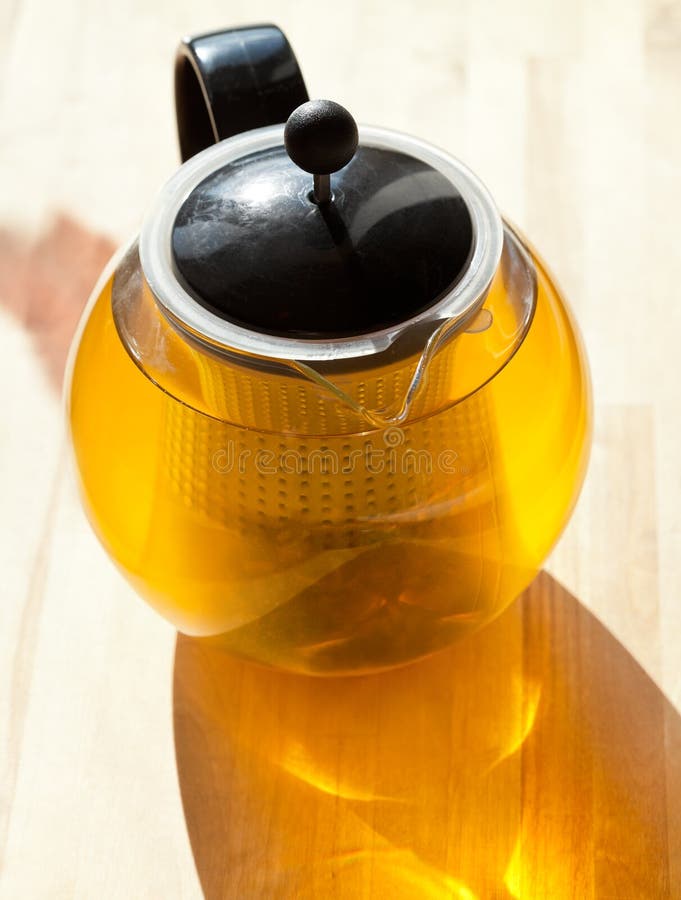 Green tee in glass teapot stock photo. Image of shadow - 39405066