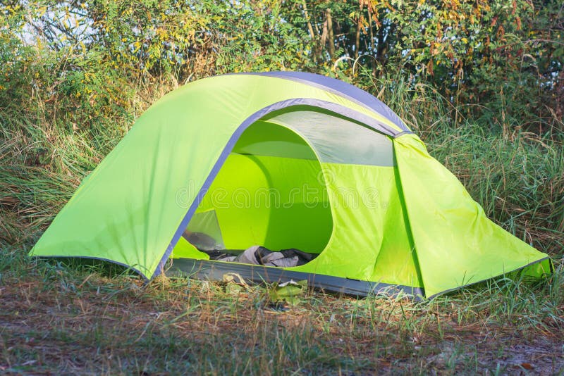 Green Tent at a Campsite in the Forest Stock Photo - Image of forest ...